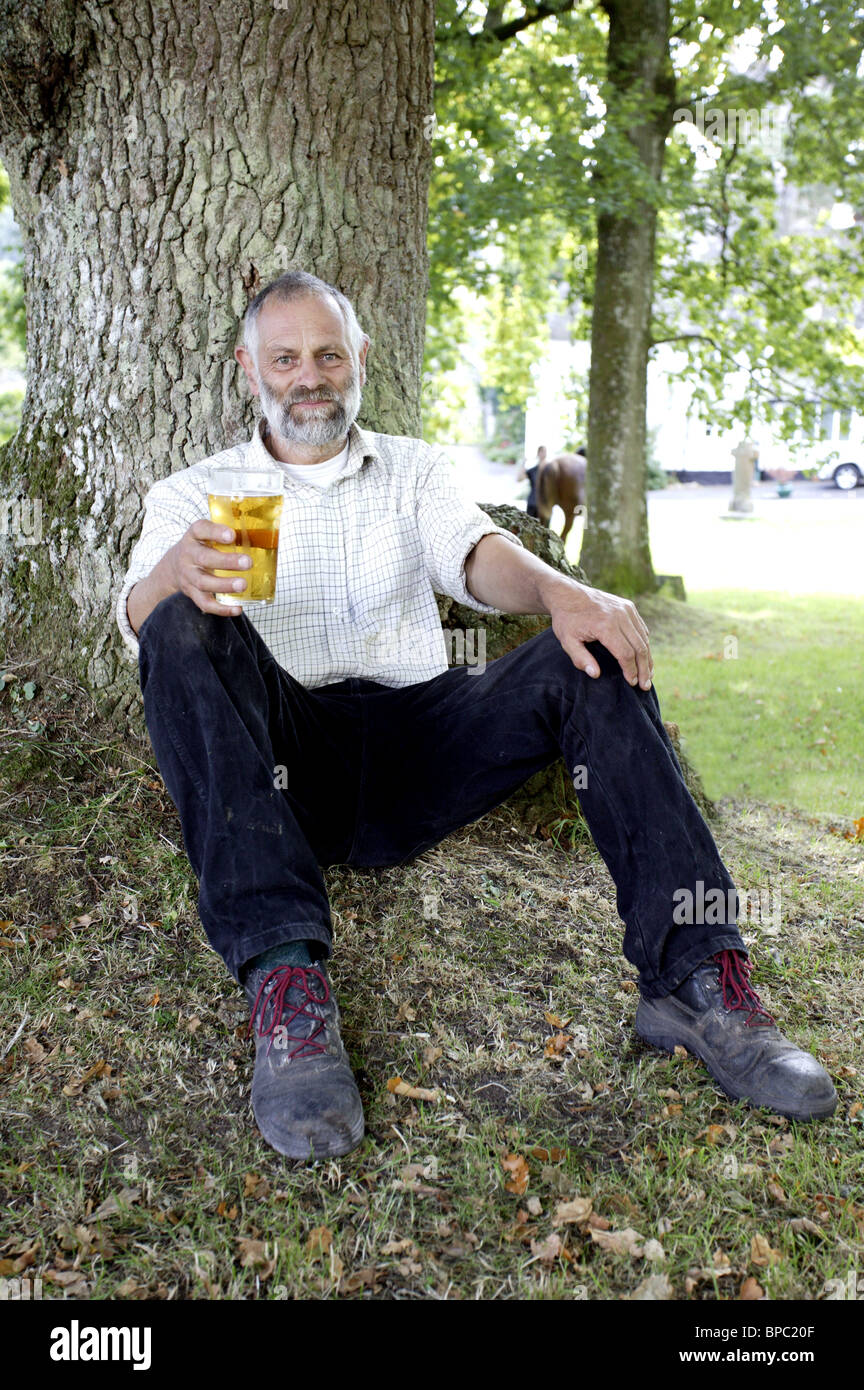 Man drinking pint of cider, Dartmoor, Devon, UK Stock Photo - Alamy