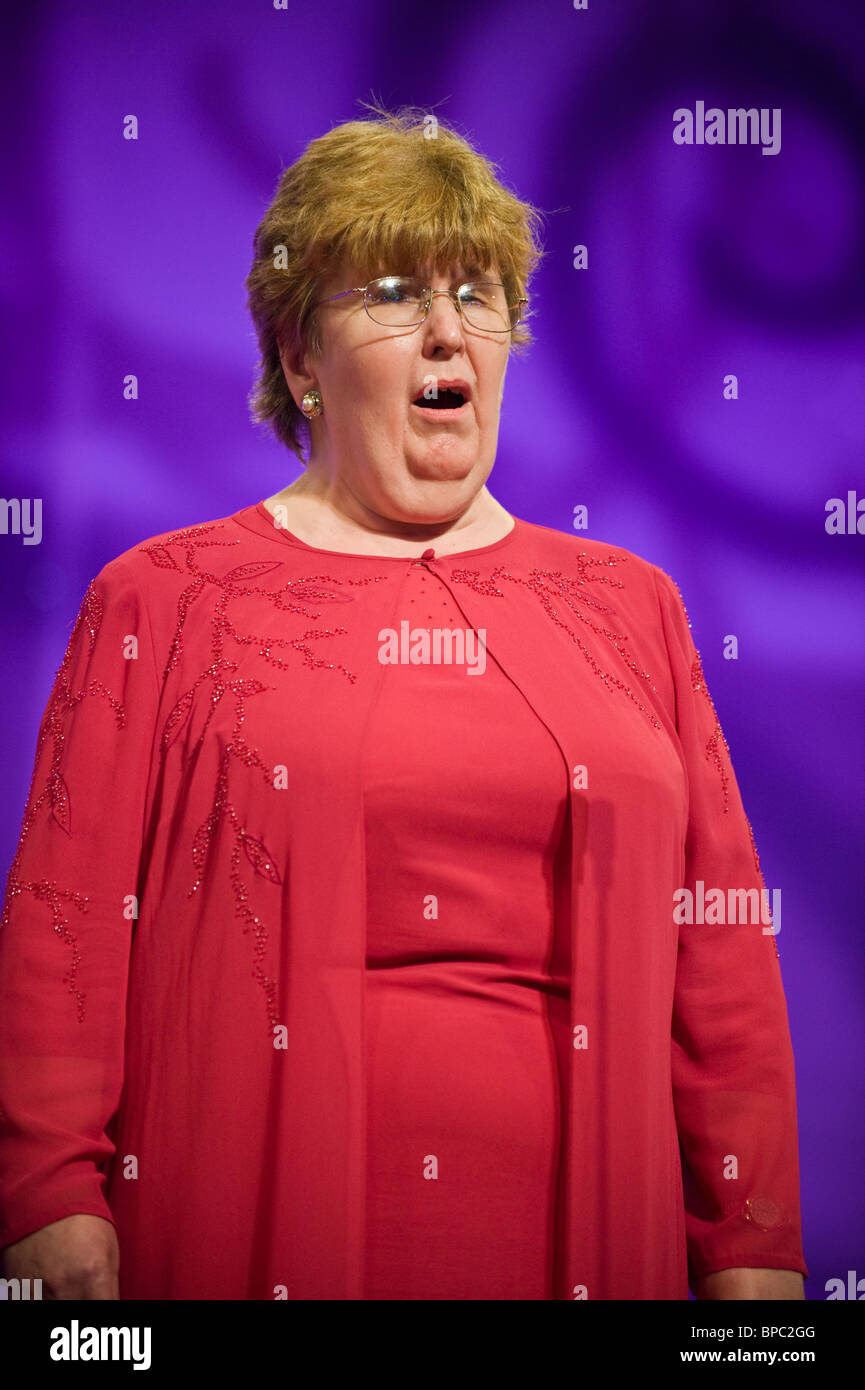 Female singer singing solo on stage in competition at the National ...