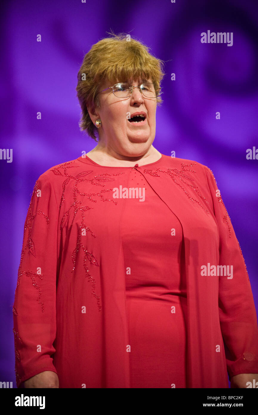 Female singer singing solo on stage in competition at the National ...