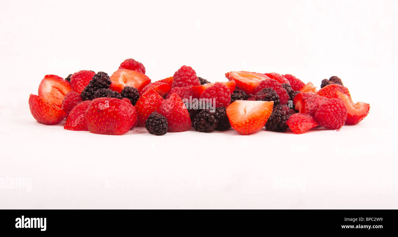 A pile of mixed berries on a white background Stock Photo - Alamy