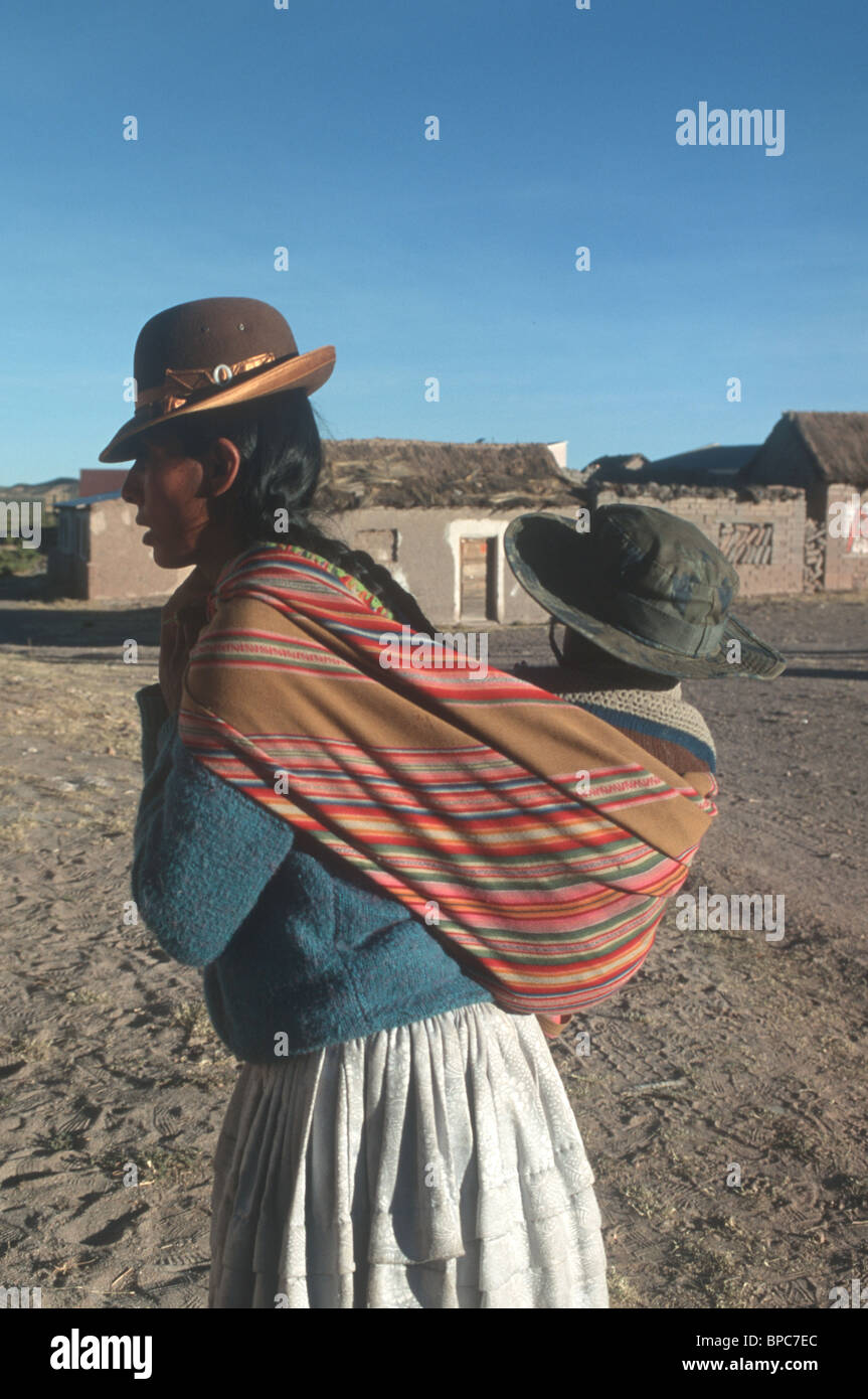 Bolivia Native aymara woman and child in the Andes Altiplano Stock ...