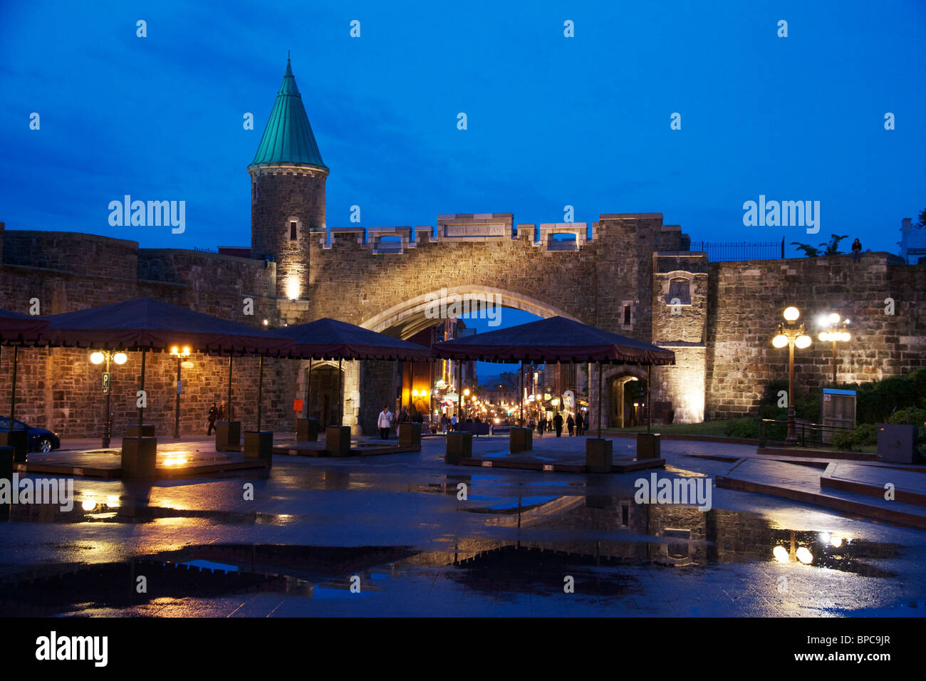 St. John's Gate at night and Place de Y'ouville. Porte St. Jean. Quebec ...