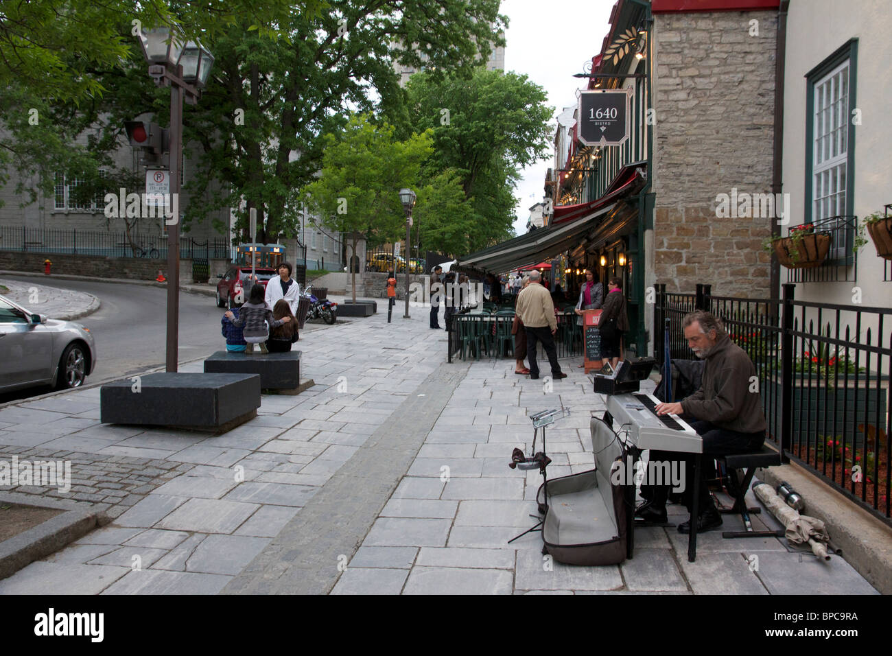 Street musician playing electronic keyboard on Rue Sainte Anne. Quebec ...