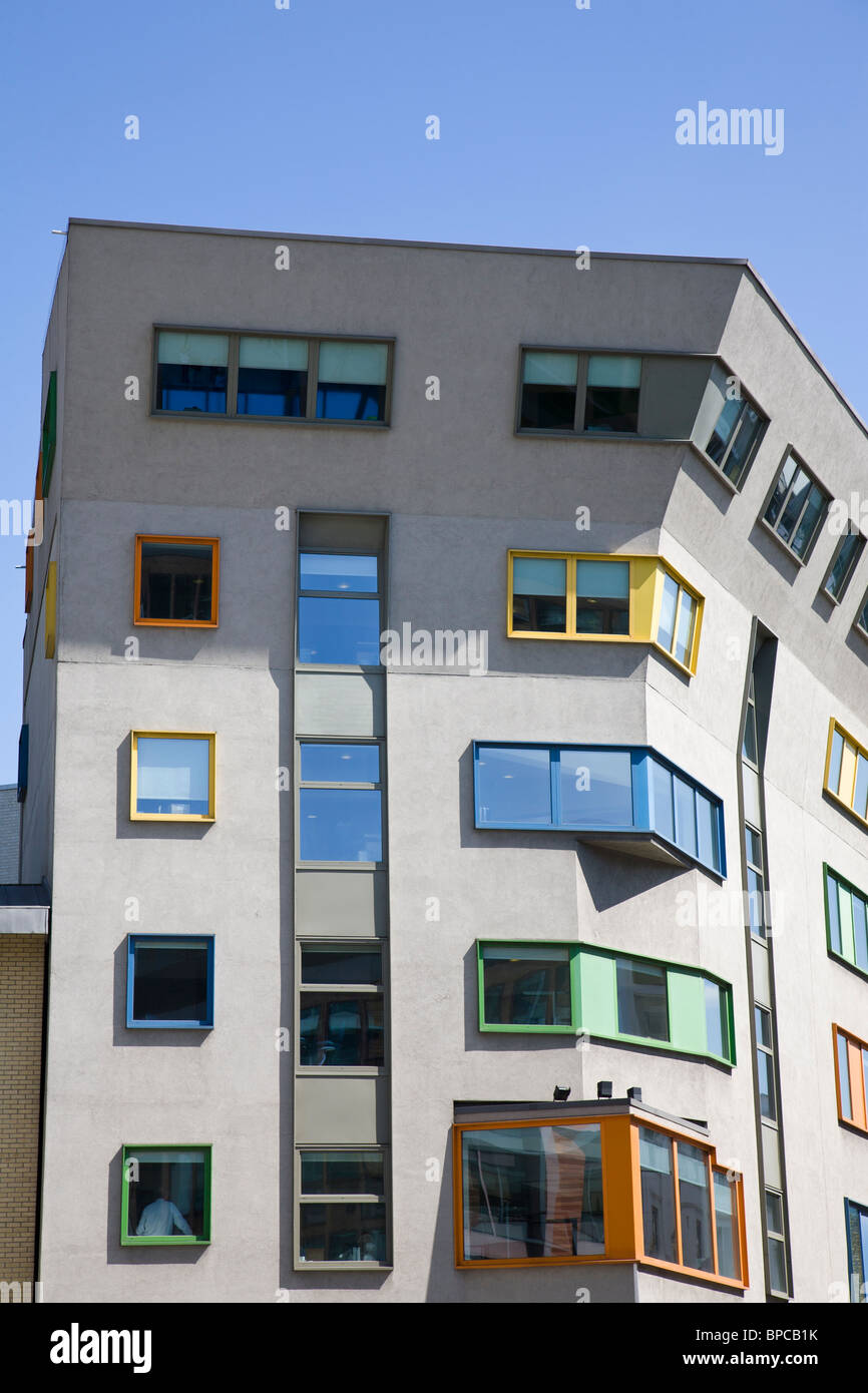 Colourful window frames on a London office building Stock Photo - Alamy