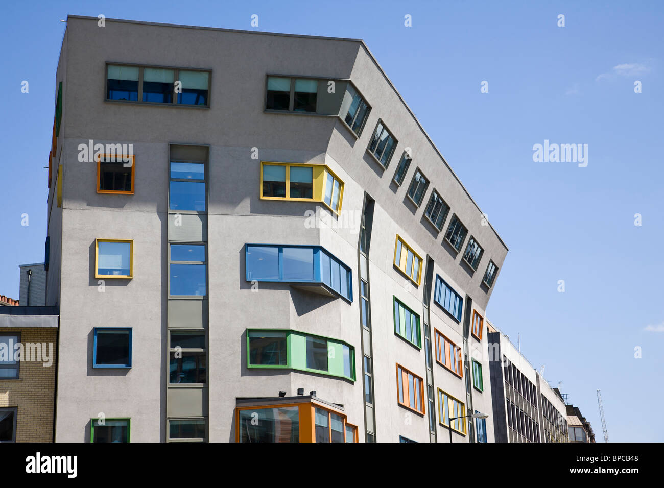 Colourful window frames on a London office building Stock Photo - Alamy