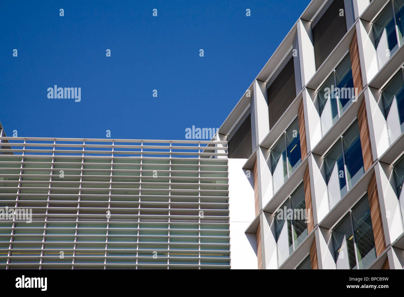 Contrasting designs of the facades of two adjacent office buildings ...