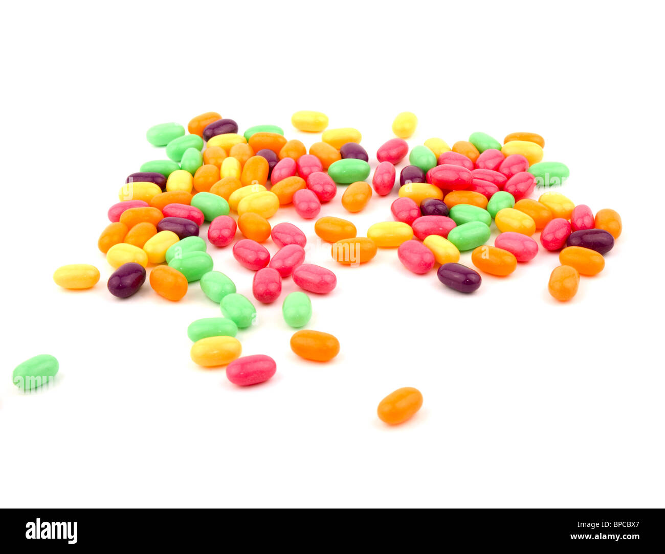Colorful sweet candies on white background Stock Photo - Alamy