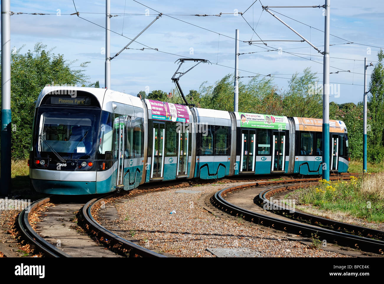 Nottingham express transit on the curved approach to Wilkinson street ... Nottingham express transit on the curved approach to Wilkinson street ...