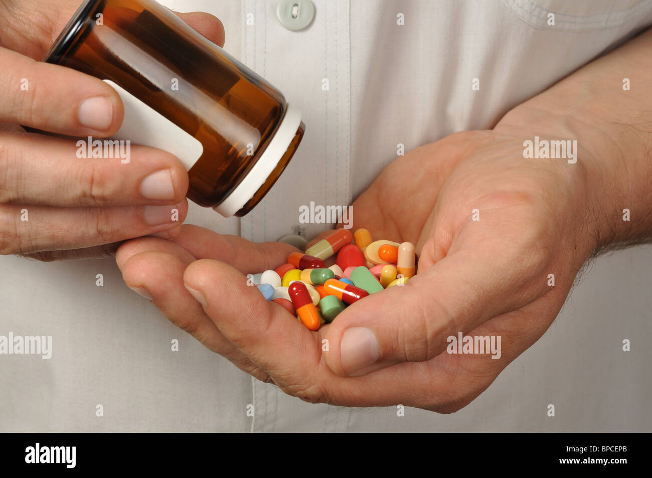 Man with Pills Stock Photo - Alamy