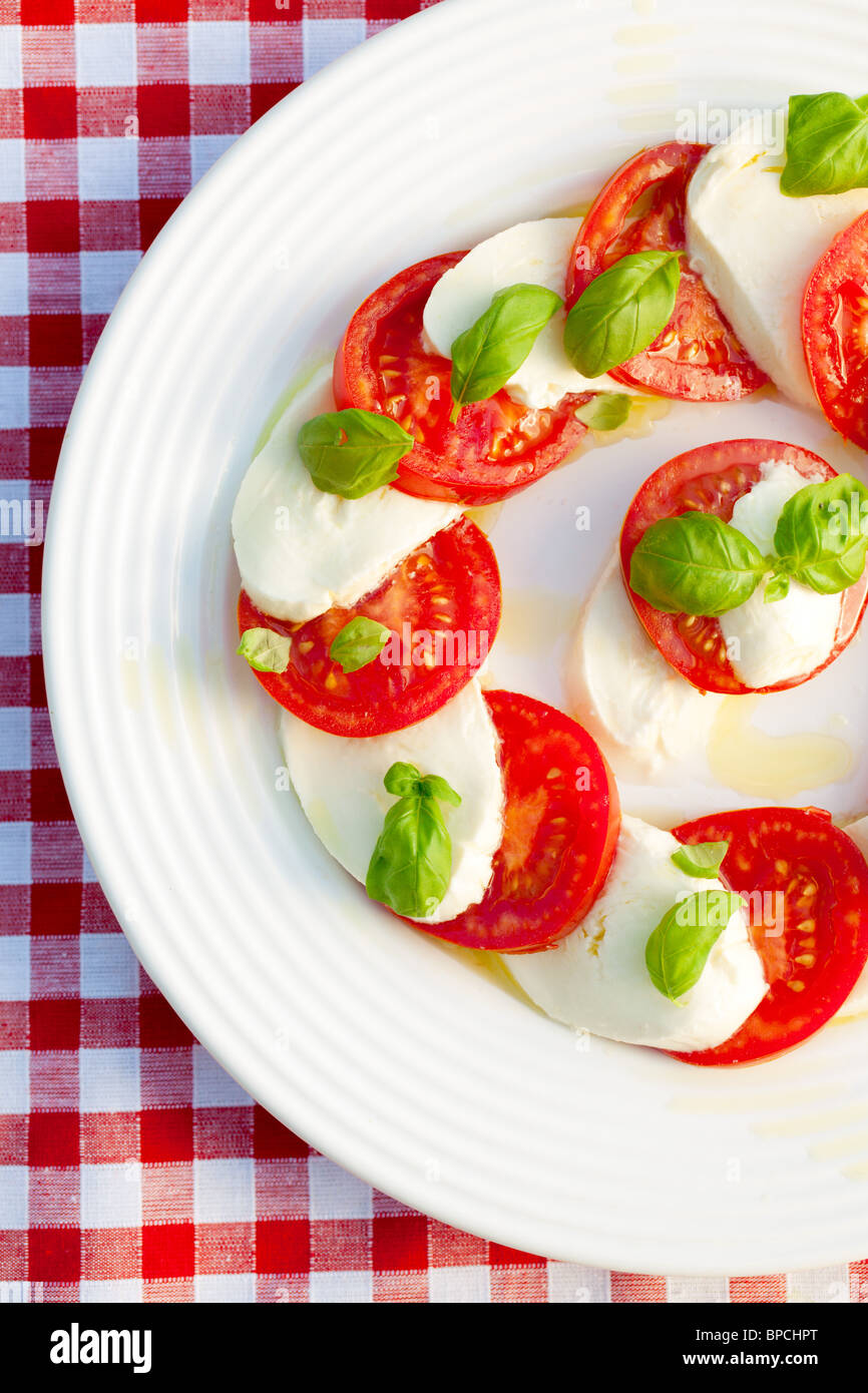 caprese salad on white plate Stock Photo - Alamy