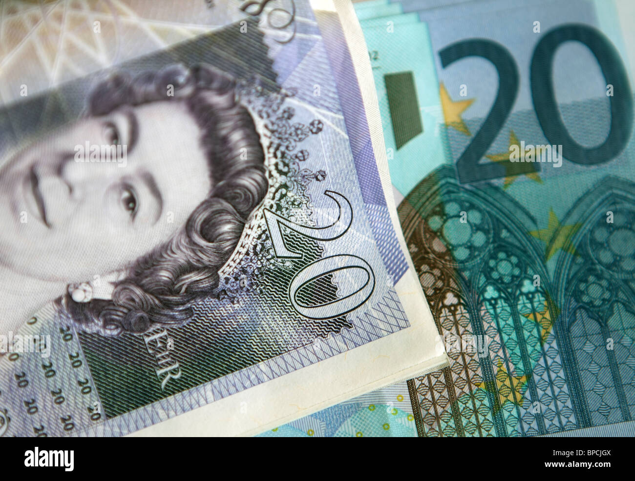 Parts of £20 sterling and 20 euro notes Stock Photo - Alamy