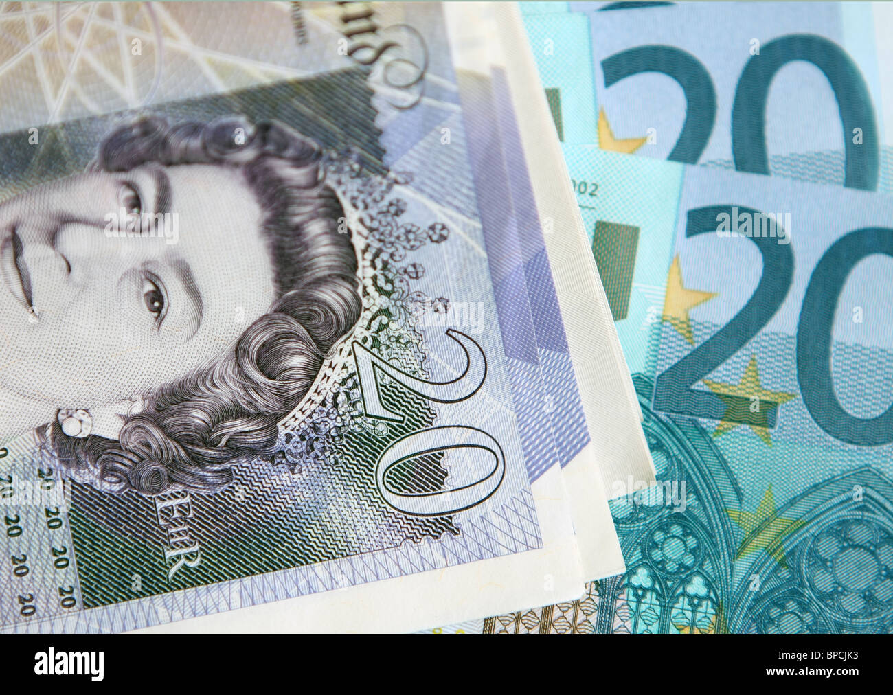 Parts of £20 sterling and 20 euro notes Stock Photo - Alamy