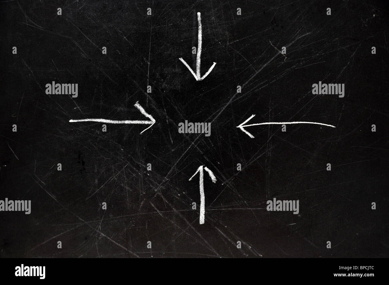 Arrows pointing center hi-res stock photography and images - Alamy