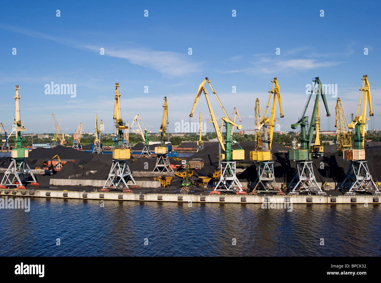 Industrial freight port in the sunshine day Stock Photo - Alamy