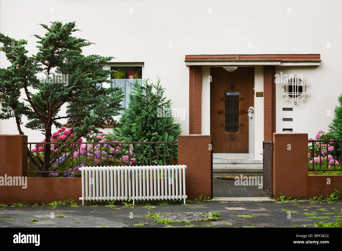 Old heating radiator outside building Stock Photo - Alamy