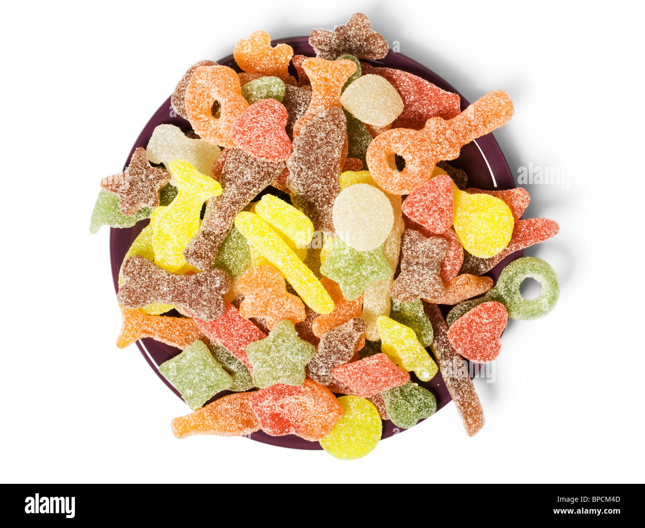 Bowl of assorted multi Colored sour sweets on white background Stock ...
