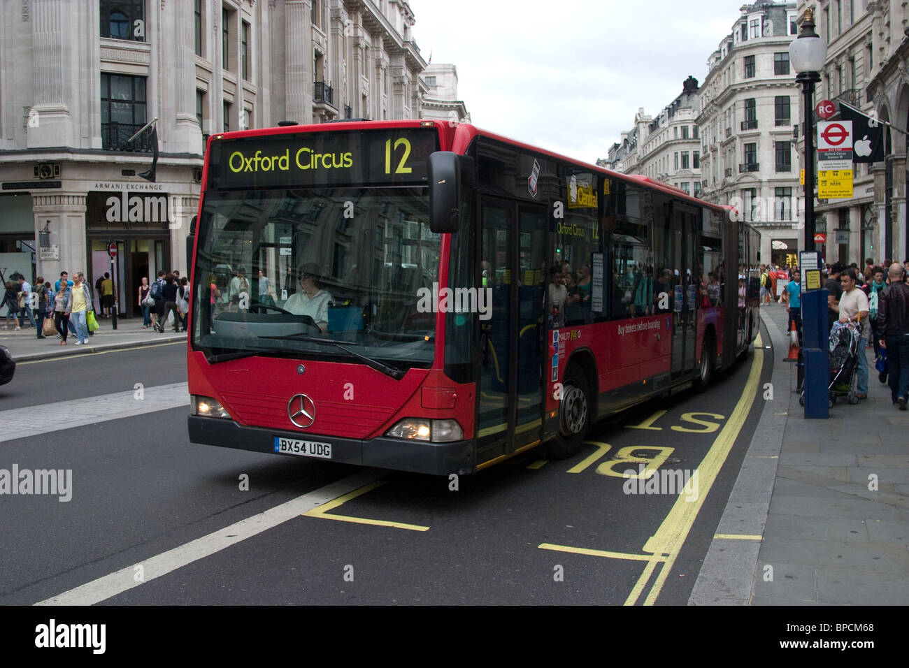 red bendy bus window bus public transport stop Stock Photo - Alamy