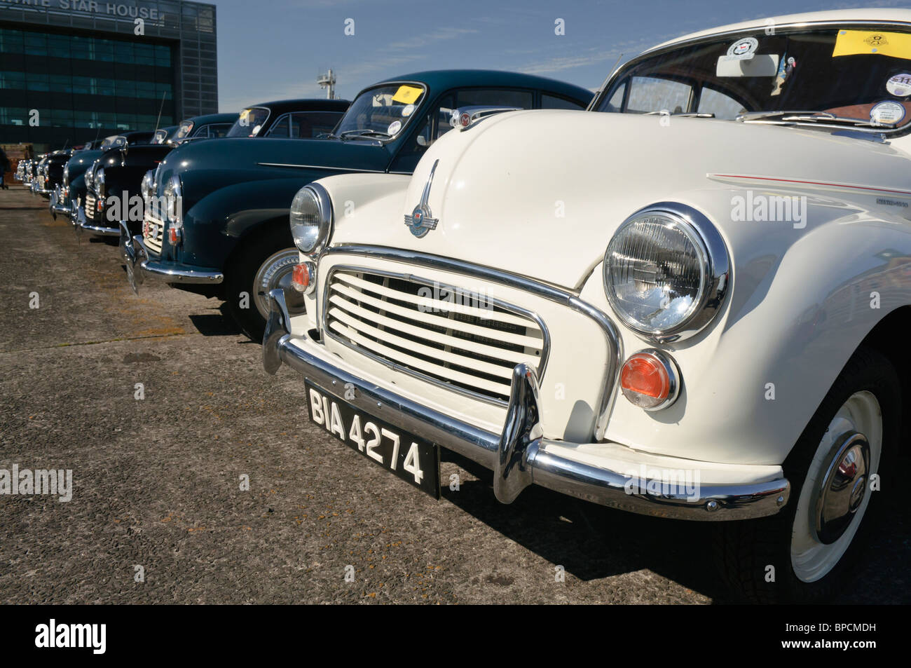 Row of Morris Minors at a classic car rally Stock Photo - Alamy