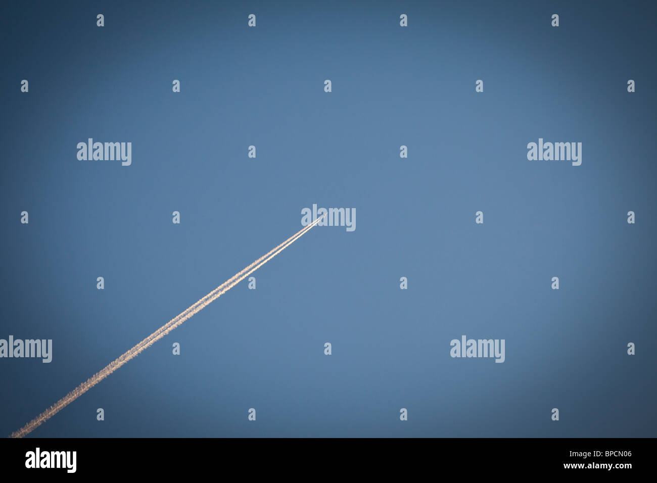 Jet aircraft contrail in sky Stock Photo - Alamy