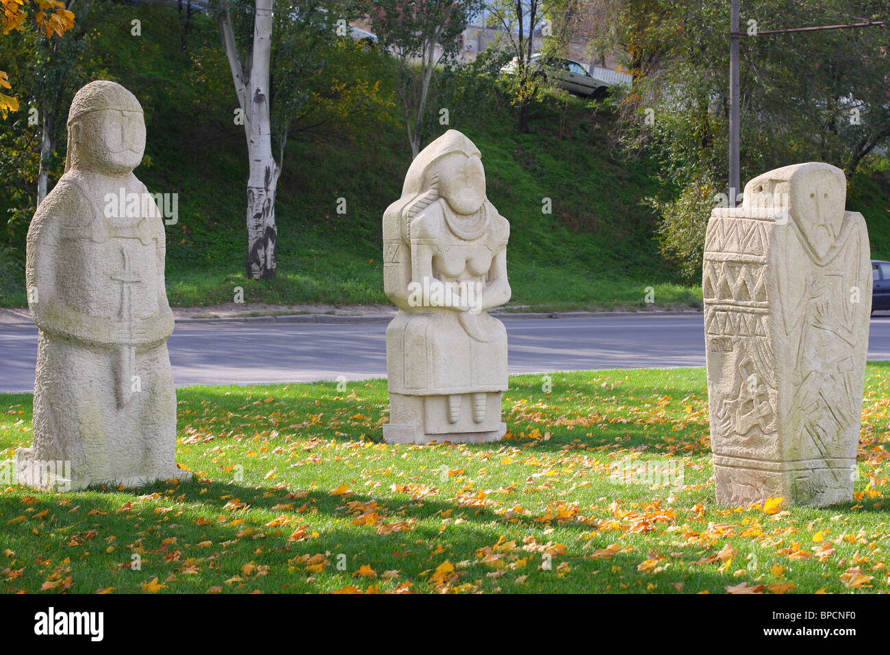 Three stone sculptures which represent ancient soldiers Stock Photo - Alamy