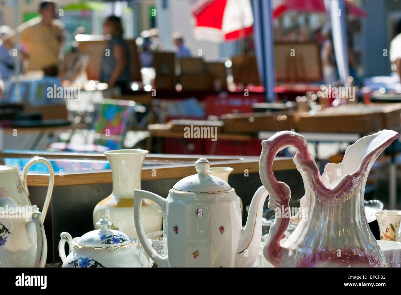 Antique market with different painted porcelain in front Stock Photo ...