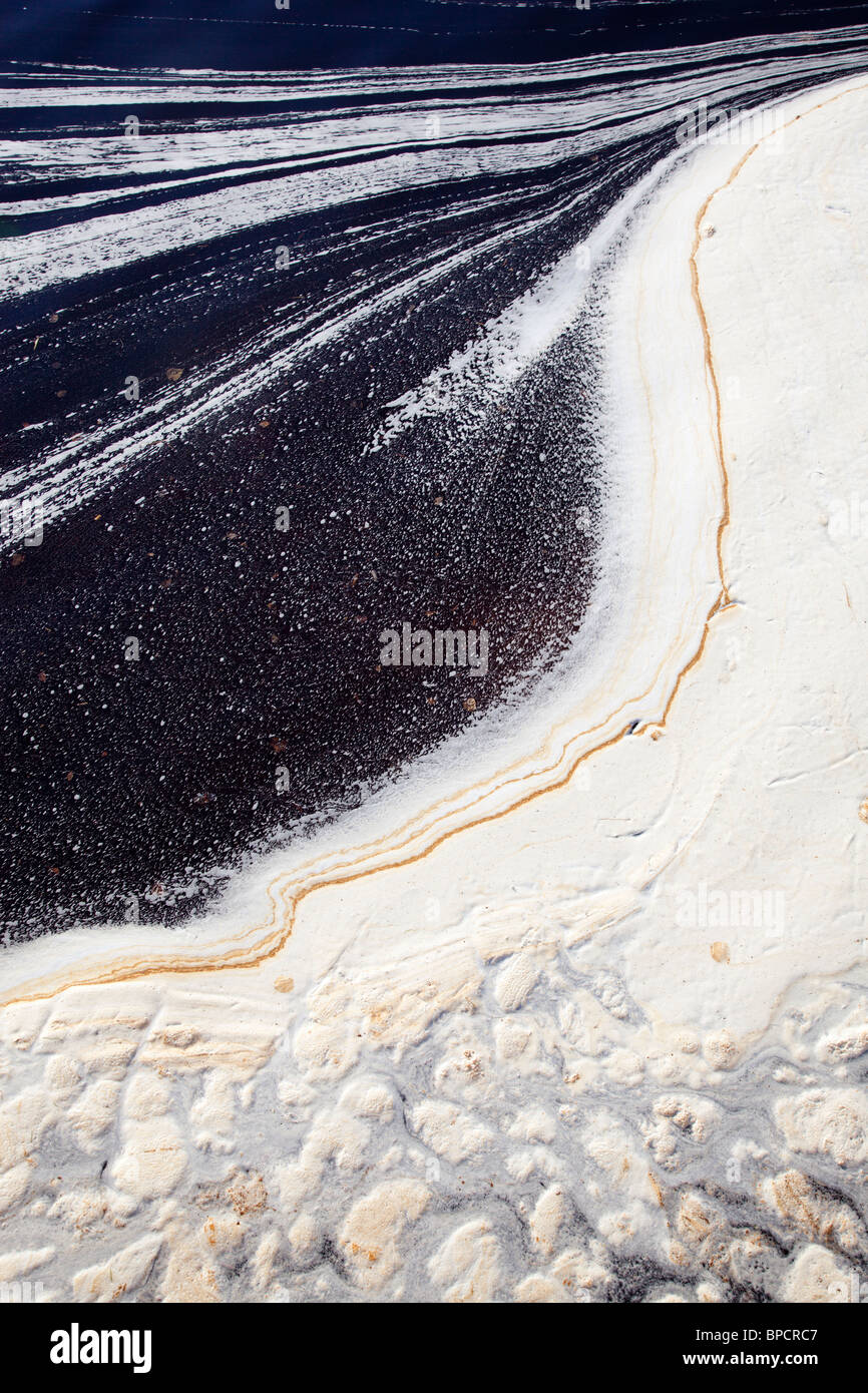 Layer of waste floating on water surface Stock Photo - Alamy