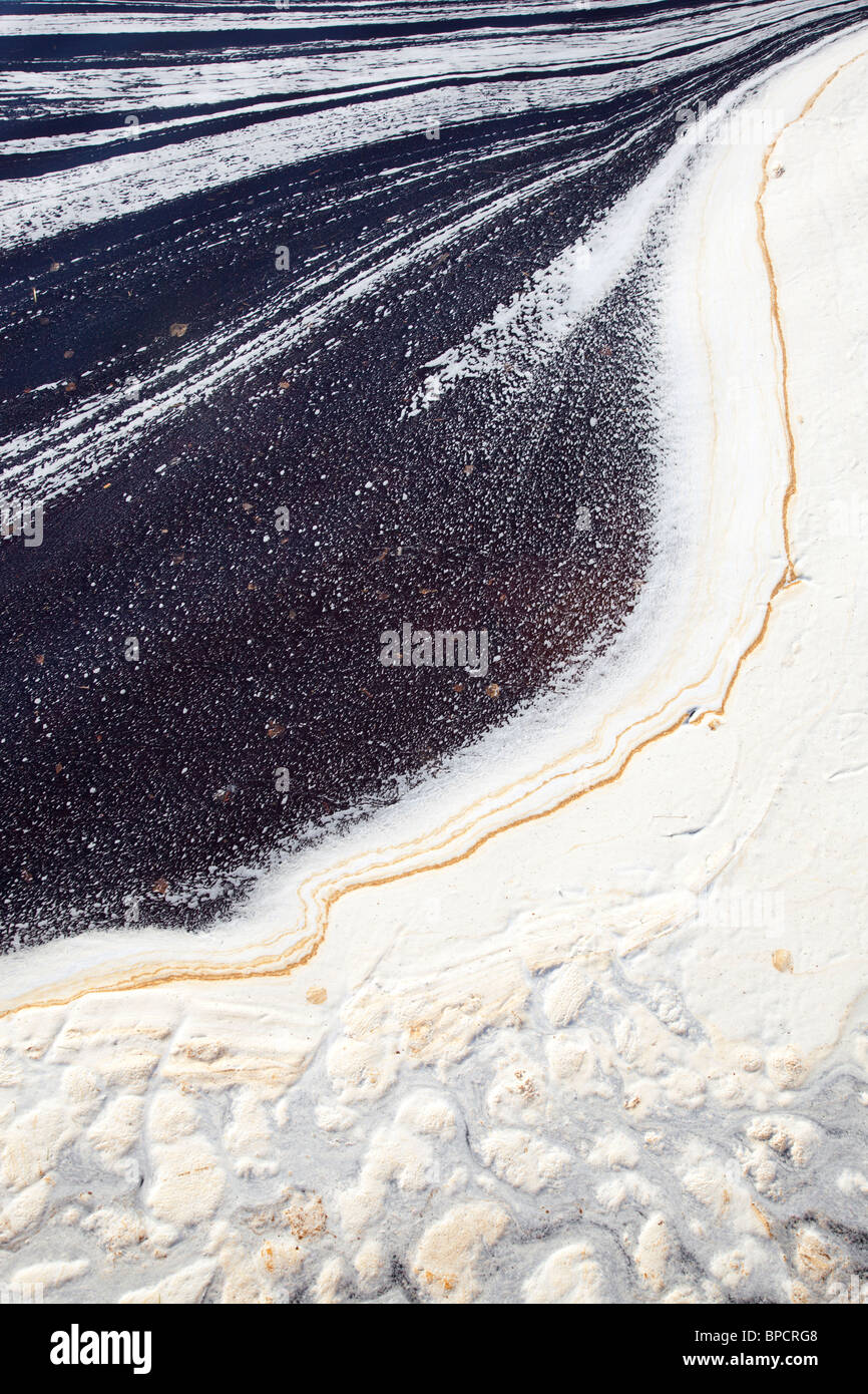 Layer of waste floating on water surface Stock Photo - Alamy