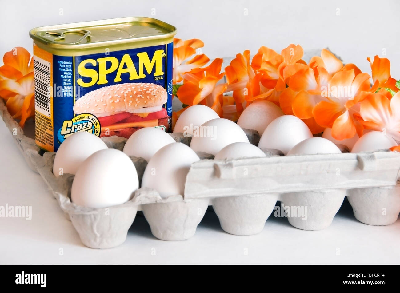 More than a dozen eggs in the carton and a can of unopened Spam are ...