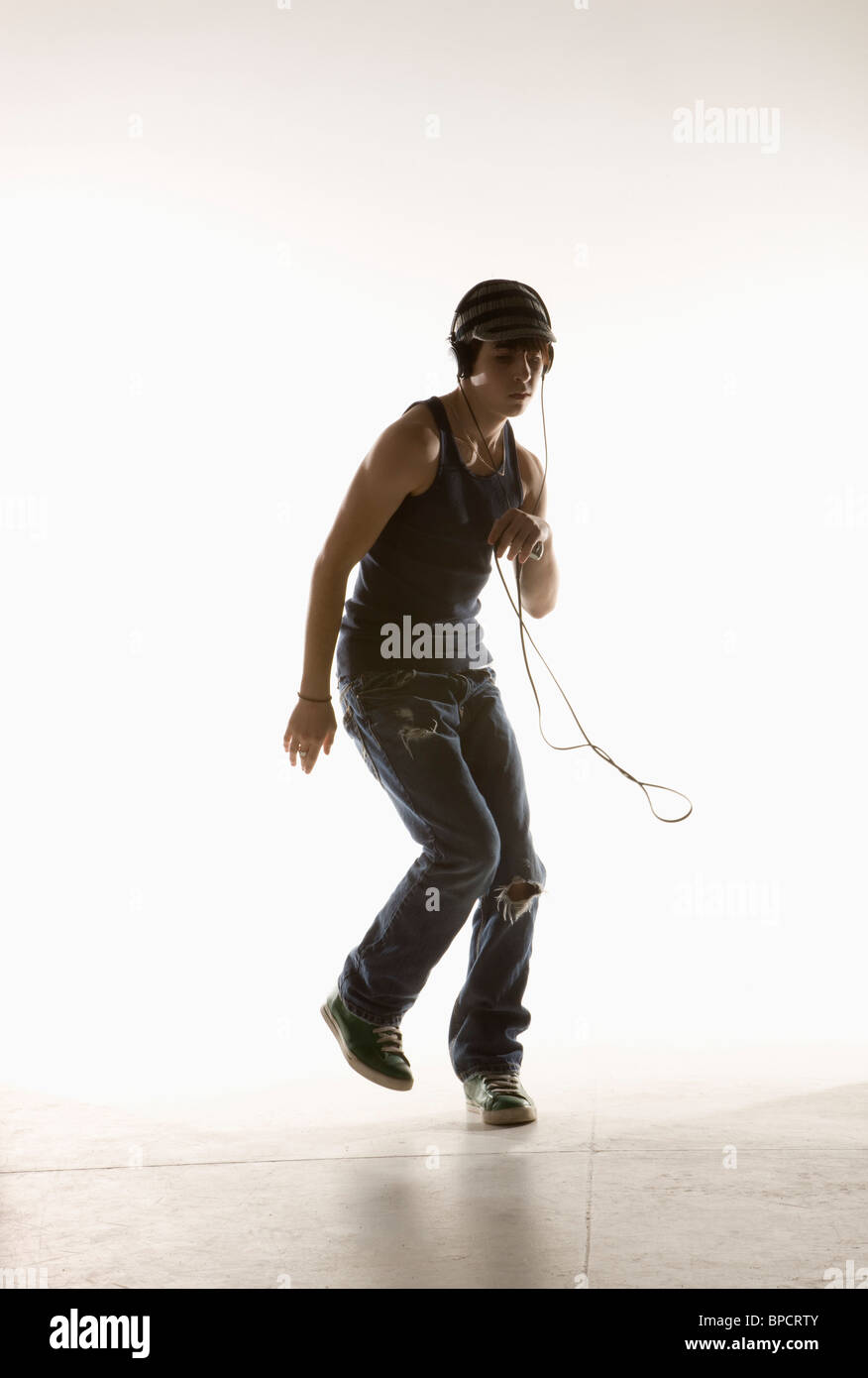 a boy dancing with headphones Stock Photo - Alamy