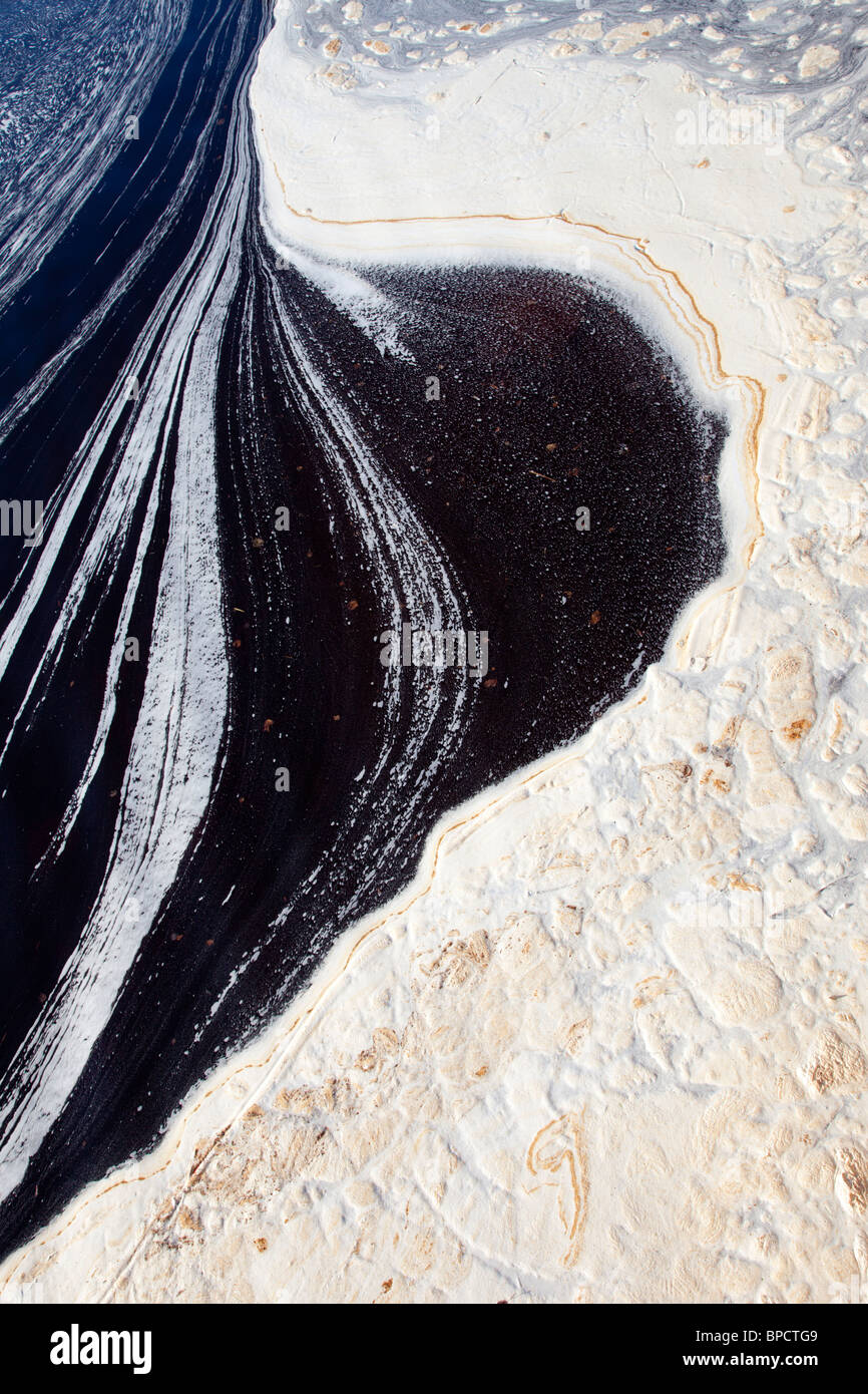 Layer of waste floating on water surface Stock Photo - Alamy