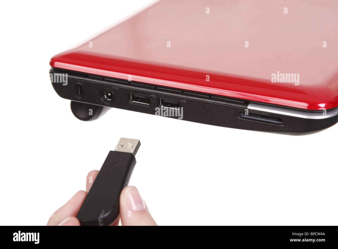 Plugging a USB device into a laptop computer Stock Photo - Alamy