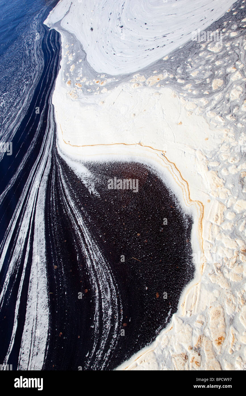 Layer of waste floating on water surface Stock Photo - Alamy