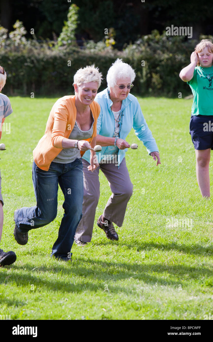 Egg and spoon race hi-res stock photography and images - Alamy