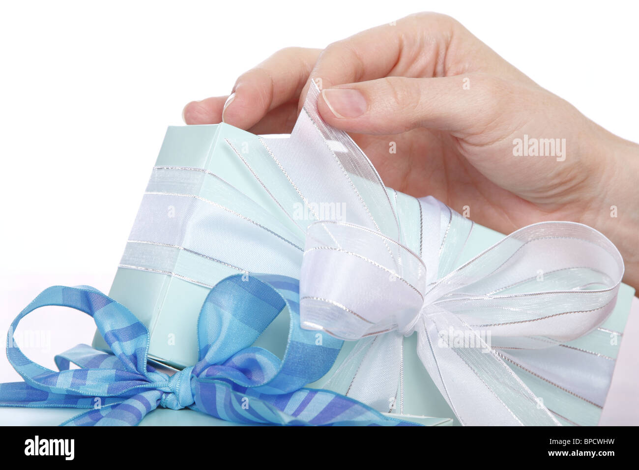Hands on gifts Stock Photo - Alamy