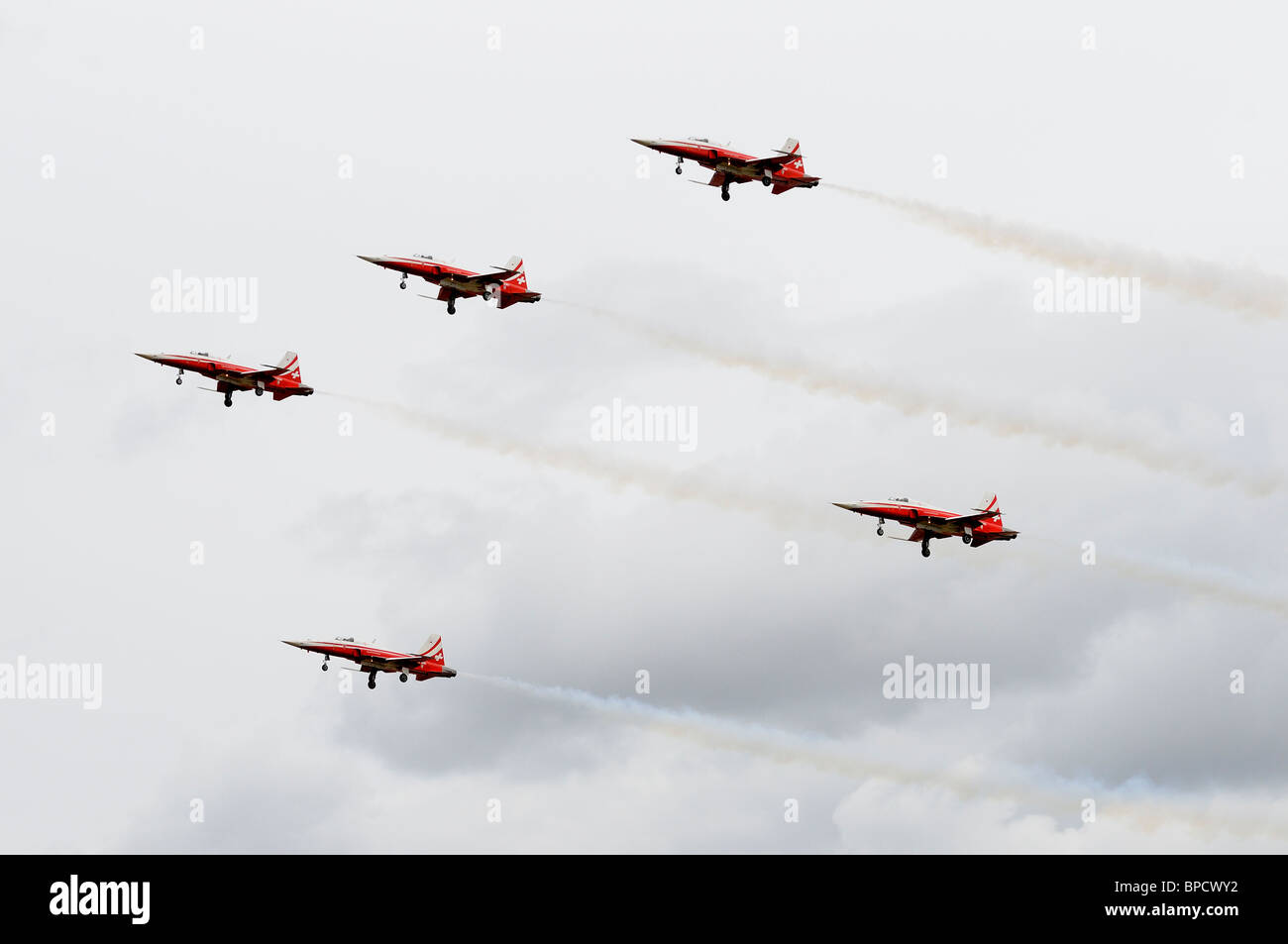 The Patrouille Swiss aerobatic display team fly their Northrop F-5E ...