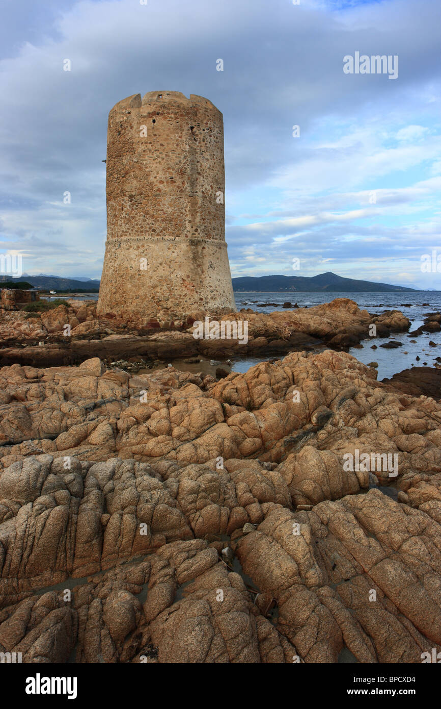 A tower on a rocky Mediterranean coast, Posada, Italy Stock Photo - Alamy