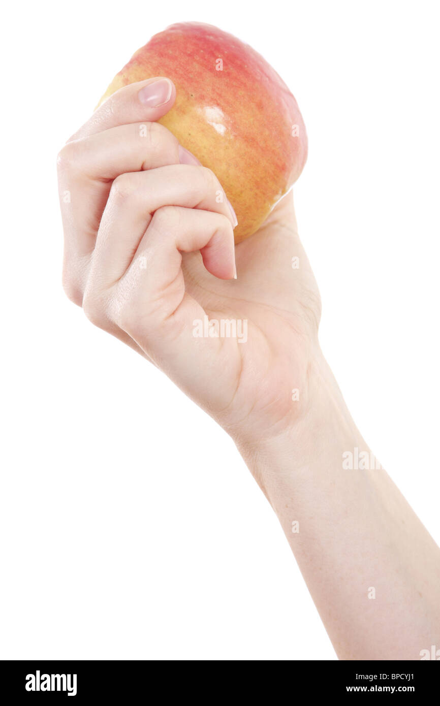 Hand holding an apple Stock Photo - Alamy