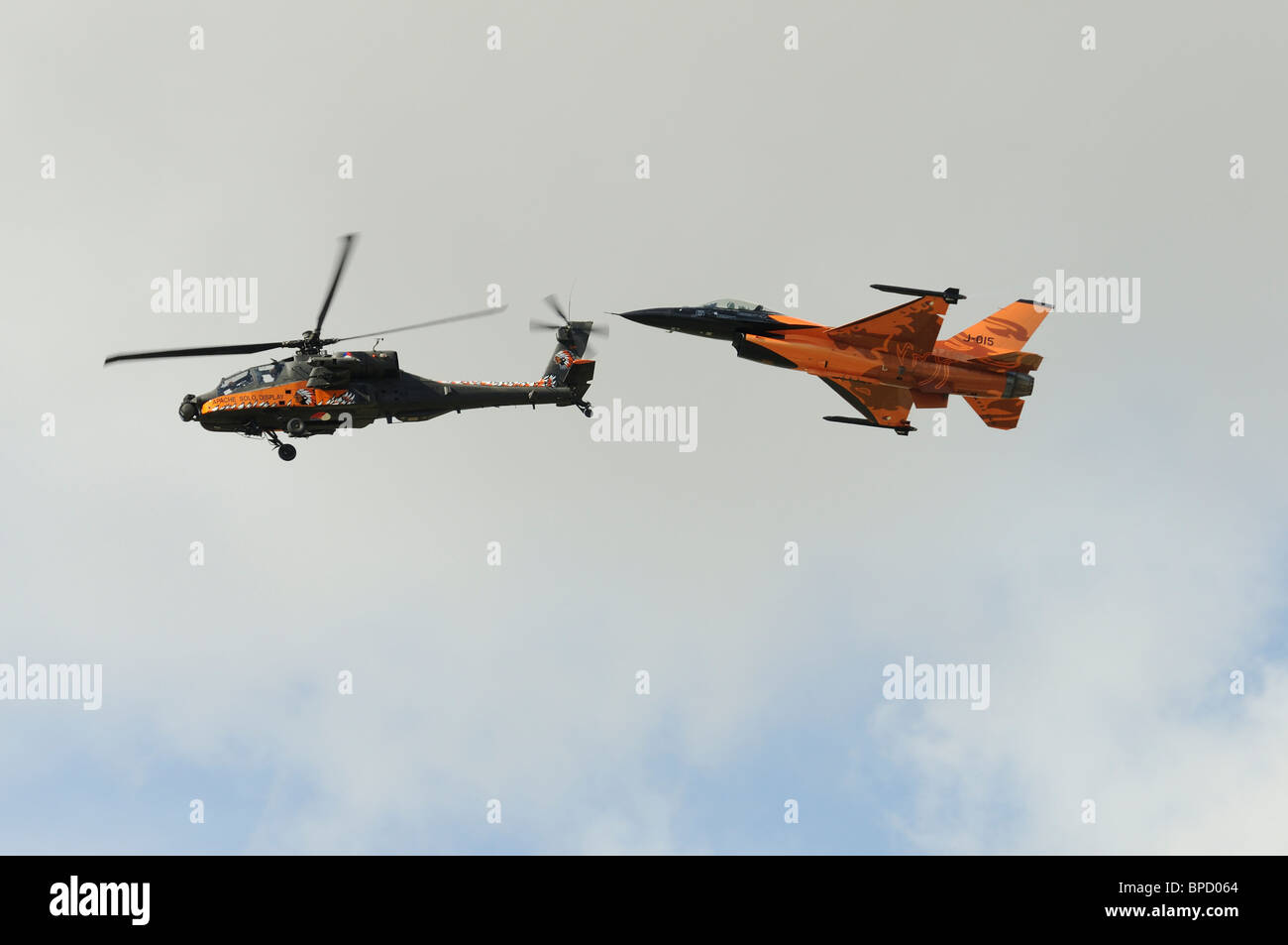 The slow flying Apache attack helicopter and the fast flying F-16 ...