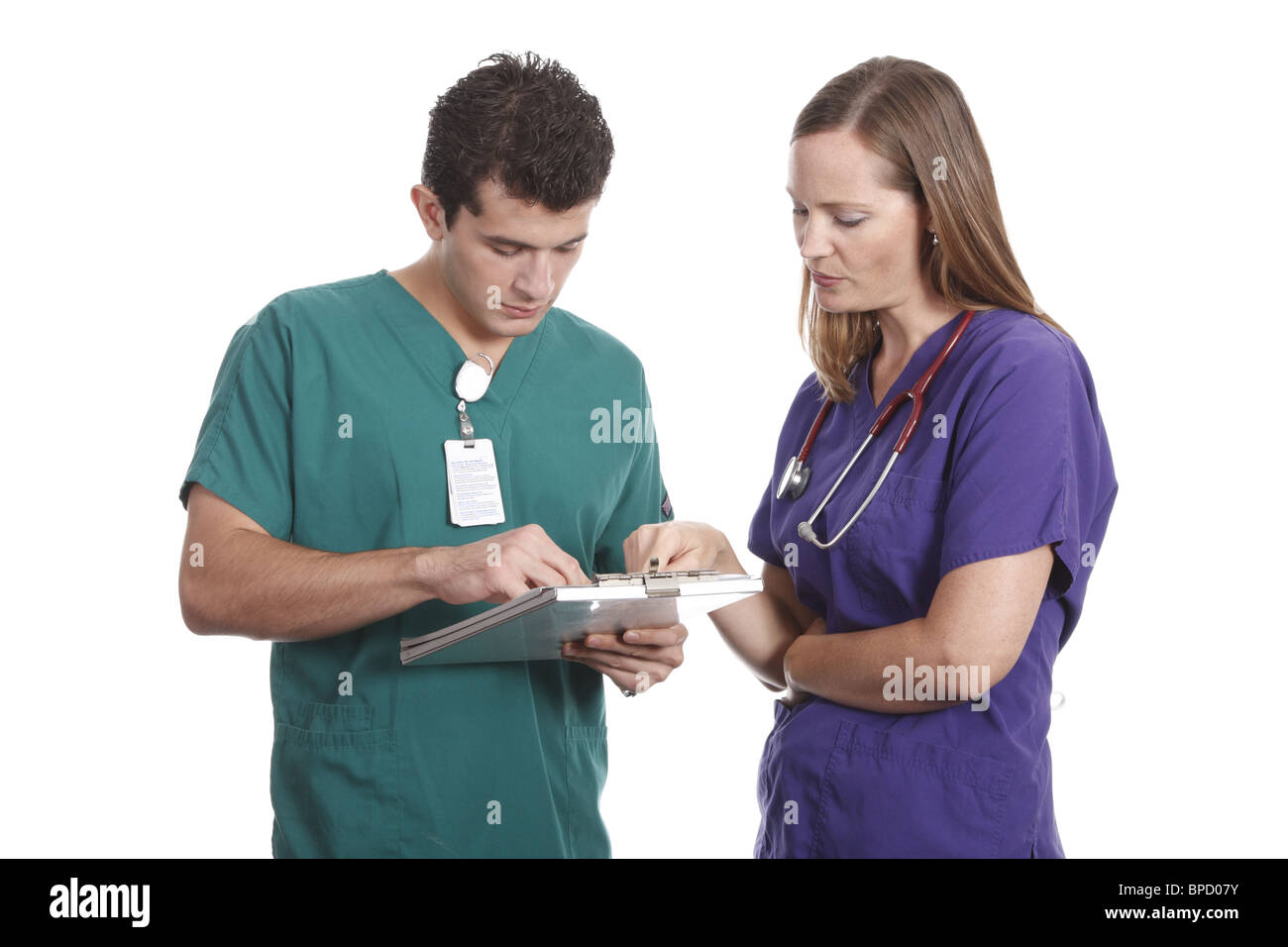 Nurses discussing patient chart Stock Photo - Alamy