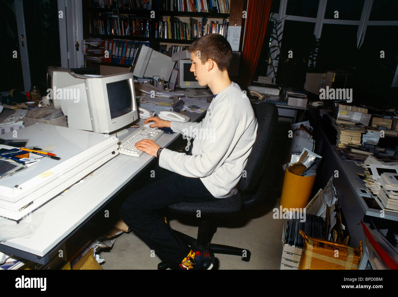 Work Experience 16 Year Old Boy Working On Computer In Office Stock ...