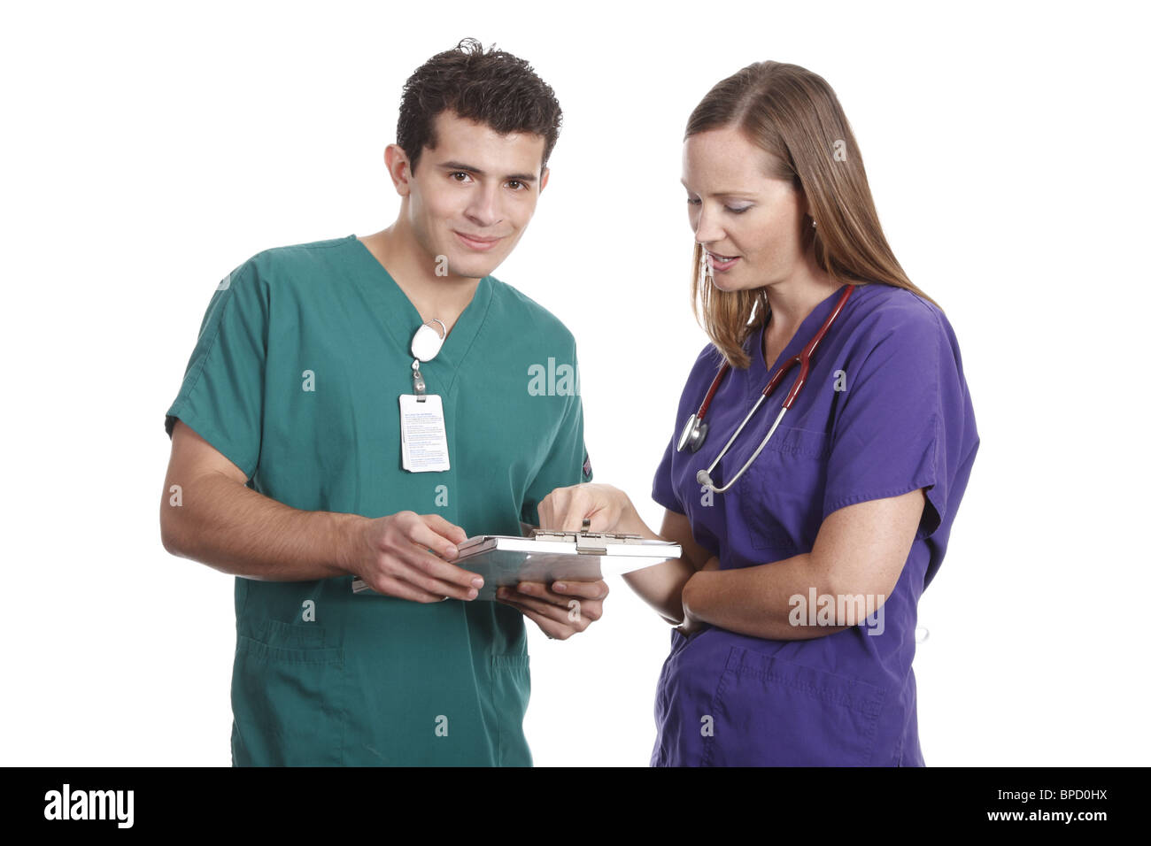 Nurses discussing patient chart Stock Photo - Alamy