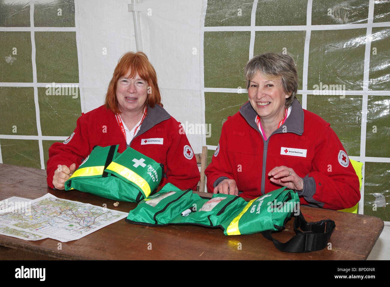 red cross volunteers at the pink ribbon walk Bleinham Stock Photo - Alamy