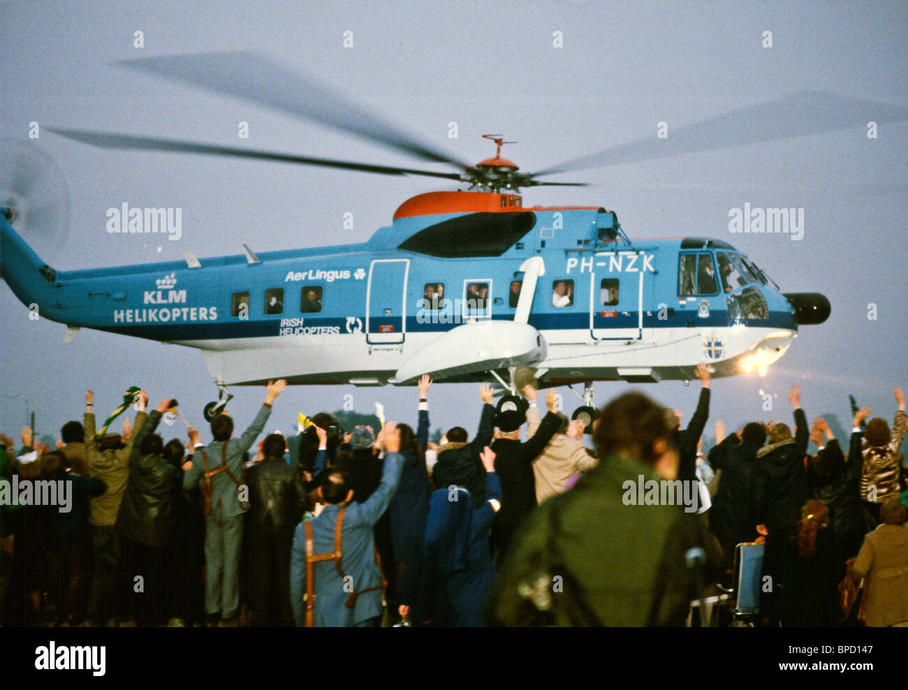 Crowds wave as Pope John Paul II departs by Aer Lingus helicopter after ...
