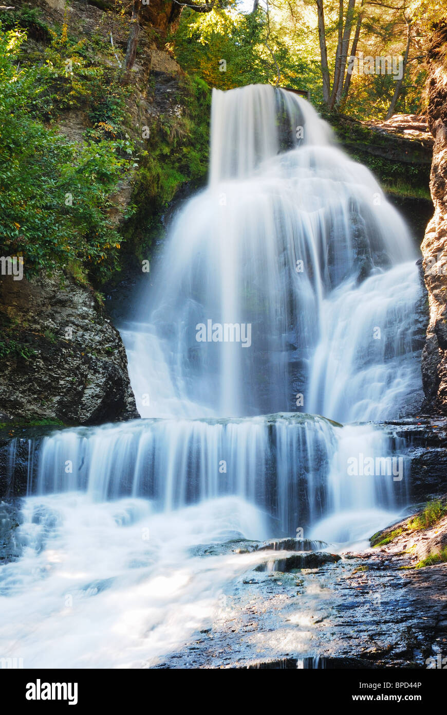 Waterfall in Autumn with rocks in mountain and woods. From Digman Falls ...