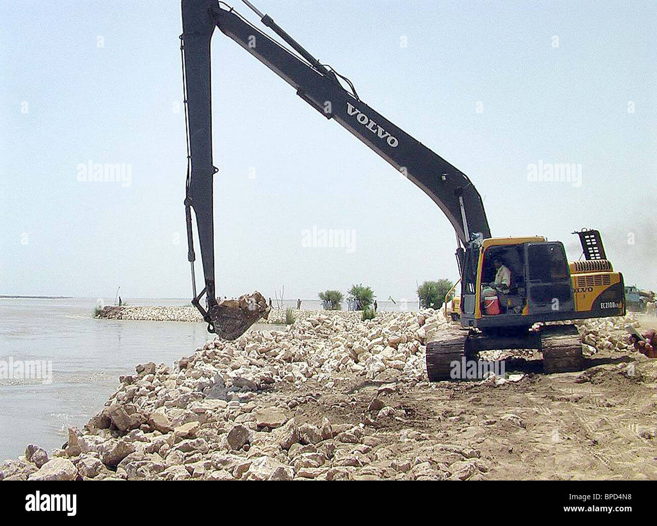Heavy machinery busies to repair breach at Aqil Agani Loop Bund in ...