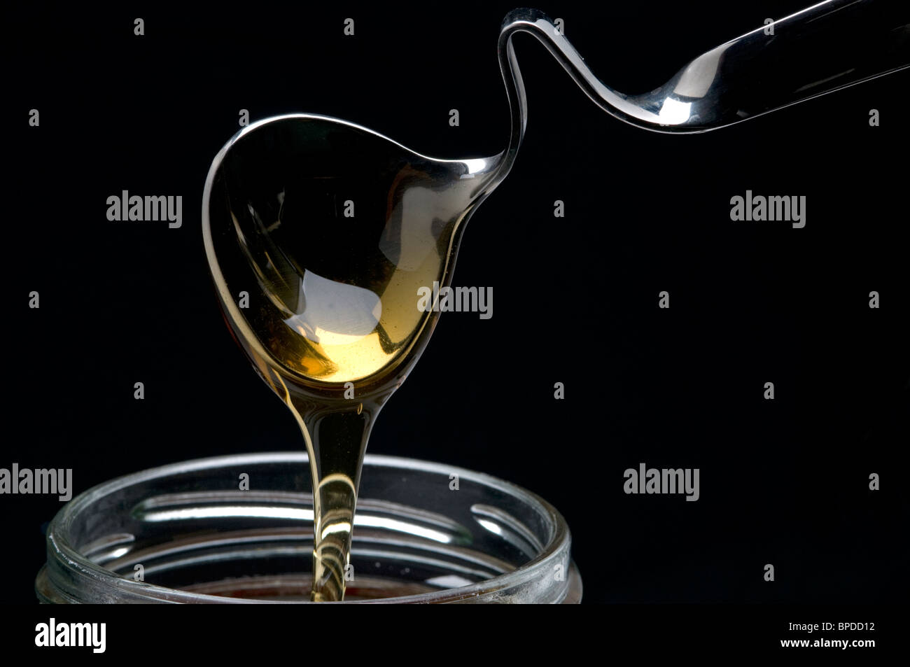 Spoonful of honey hi-res stock photography and images - Alamy
