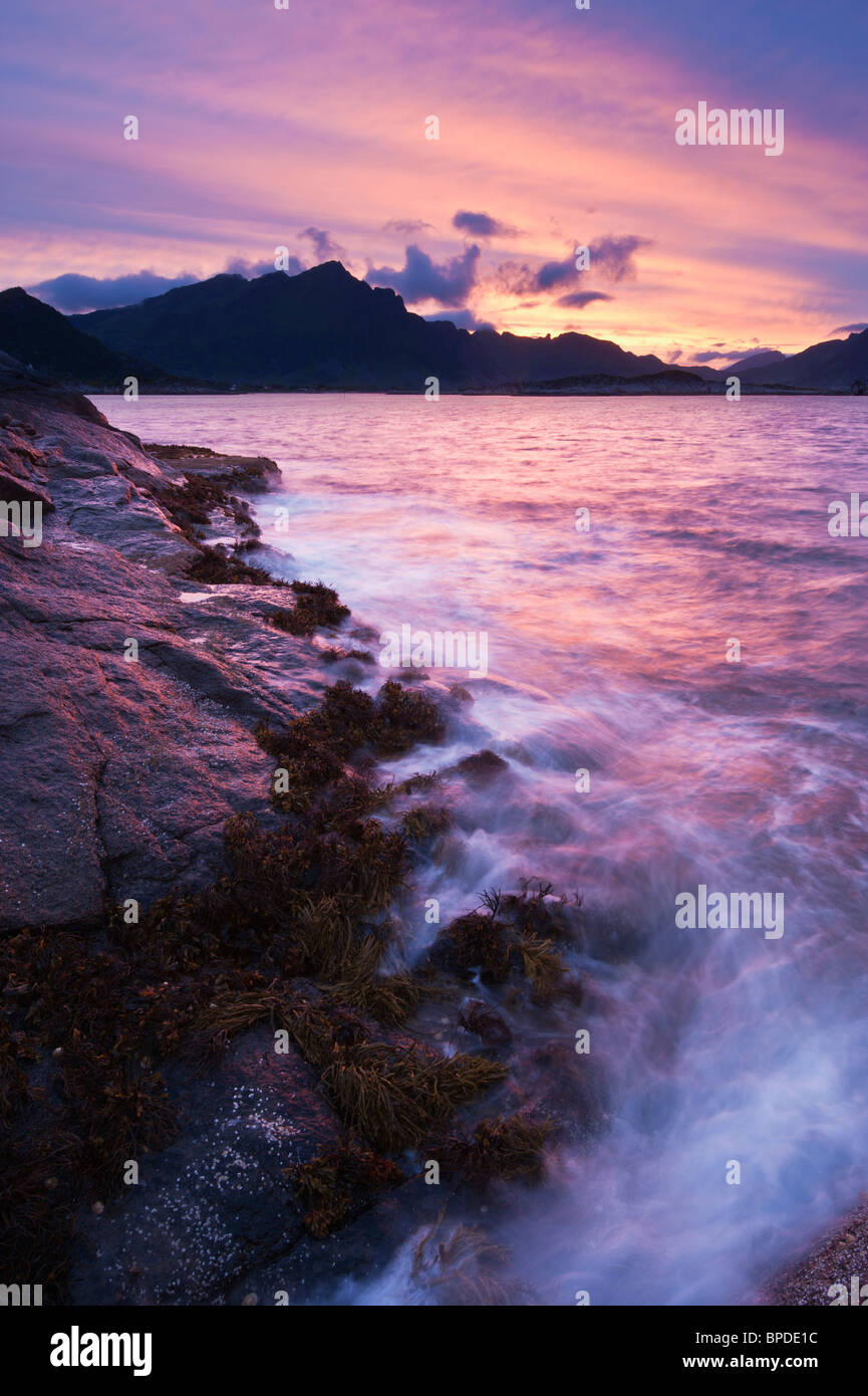 Rugged rocky coastline and mountain view at Stamsund, Vestvågøy ...