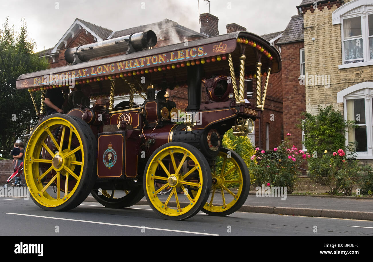 A vintage steam traction engine parades through streets during the 2009 ...