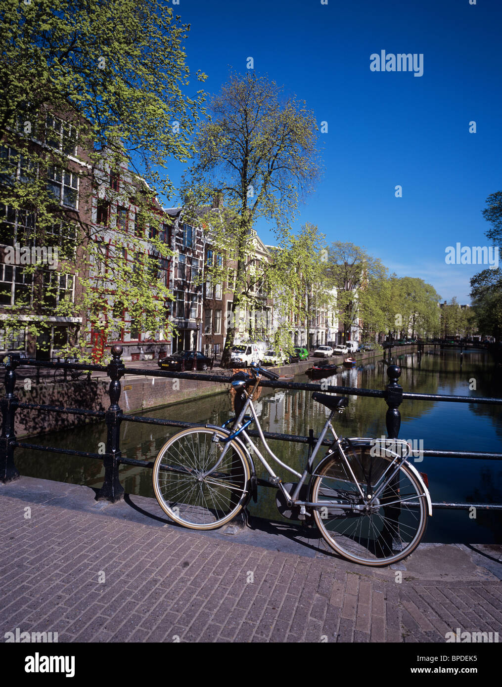 Amsterdam - Canals & bicycles, iconic symbols of the city Stock Photo ...