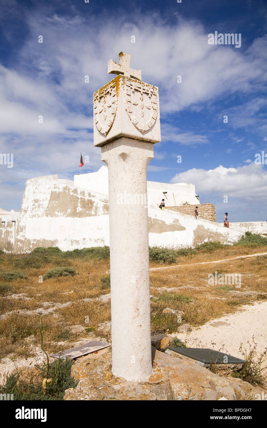 A cross showing the coat of arms of Portugal stands in Sagres Fortress ...